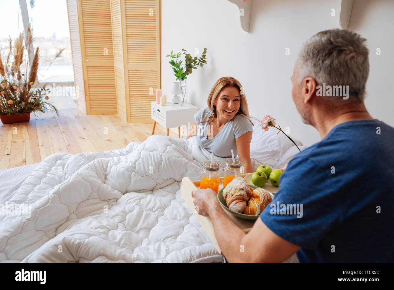Loving man husband bringing breakfast hi-res stock photography and ...