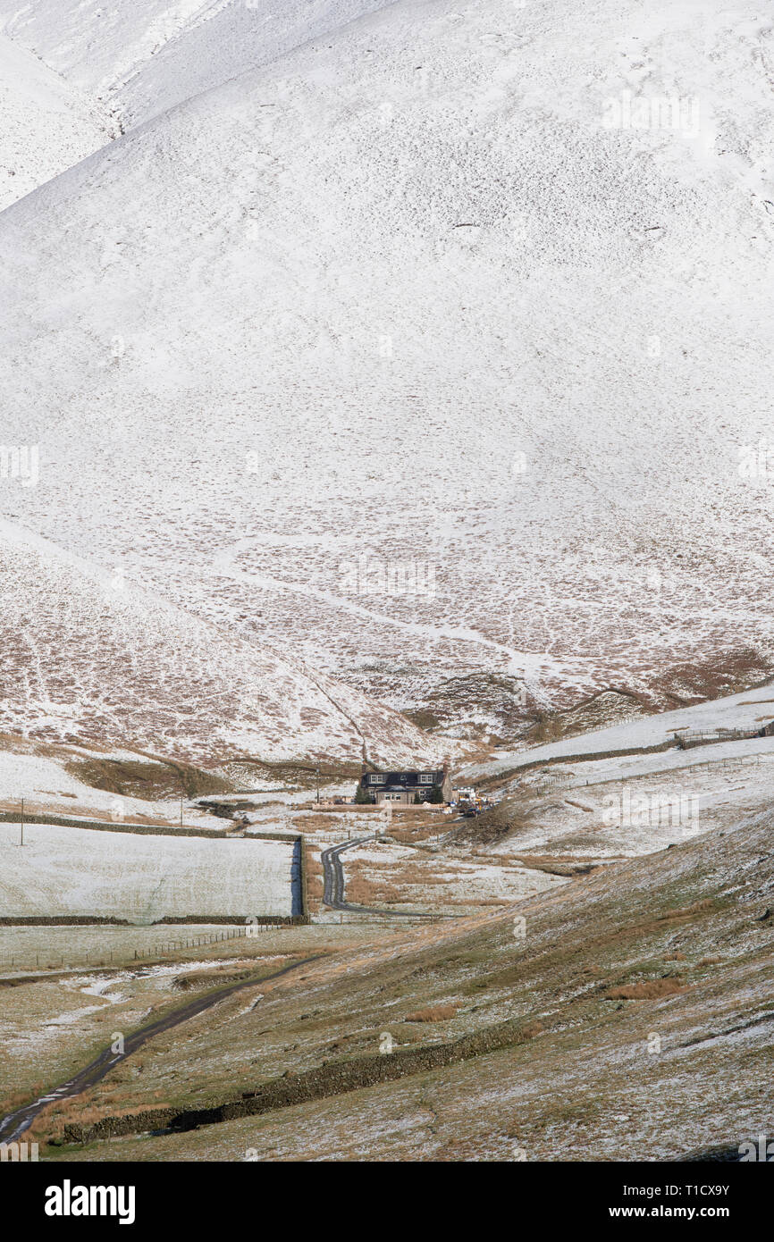 Farmhouse in the snow covered Dalveen Pass in the Lowther Hills ...