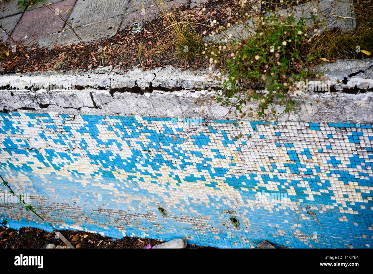 Broken blue azure retro tiles mosaic in abandoned pool - Berengaria ...