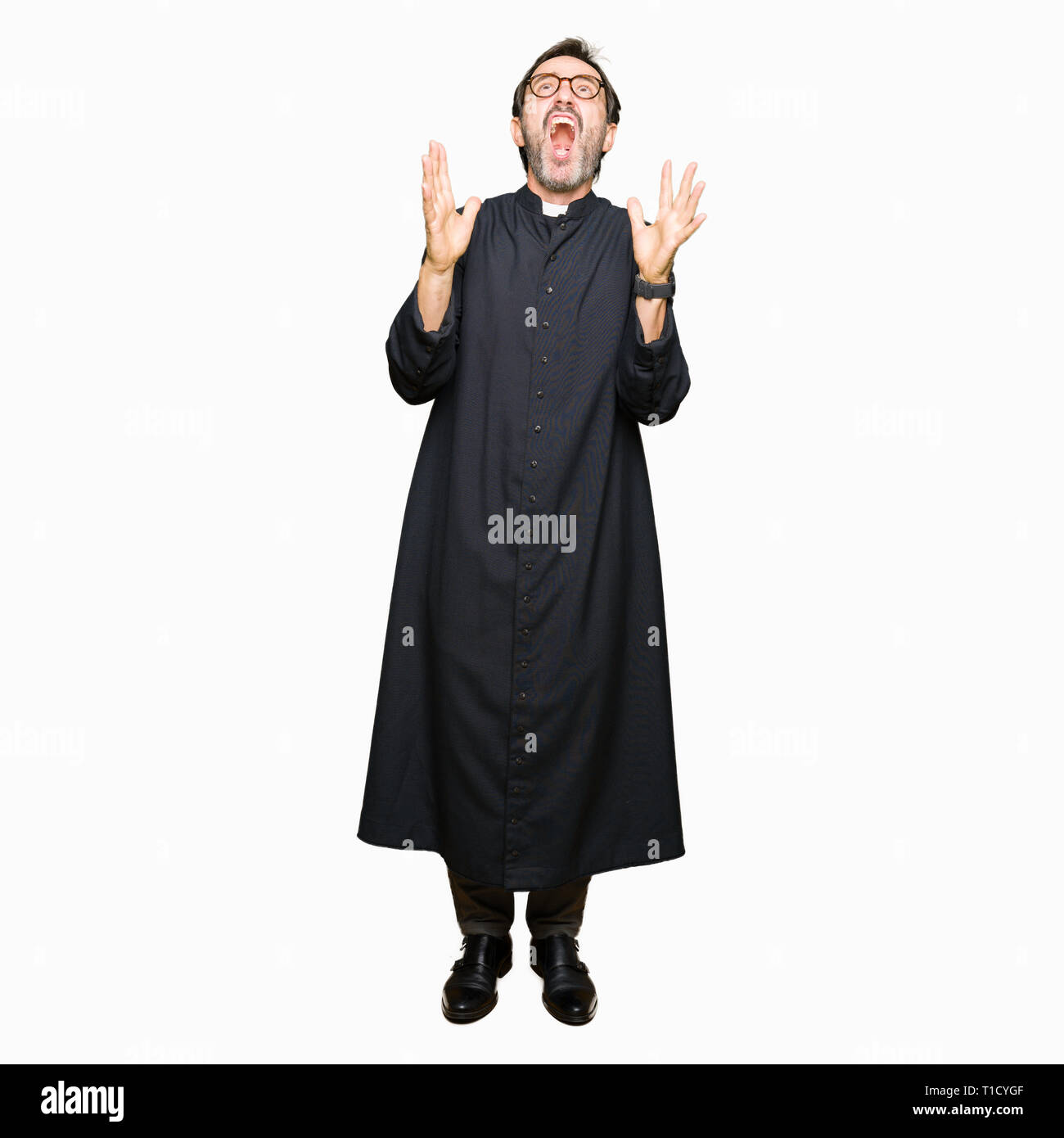 Priest hands raised Cut Out Stock Images & Pictures - Alamy