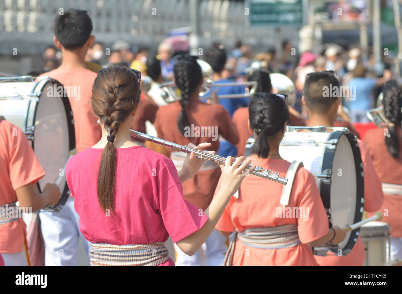 Young woman playing flute hi-res stock photography and images - Alamy