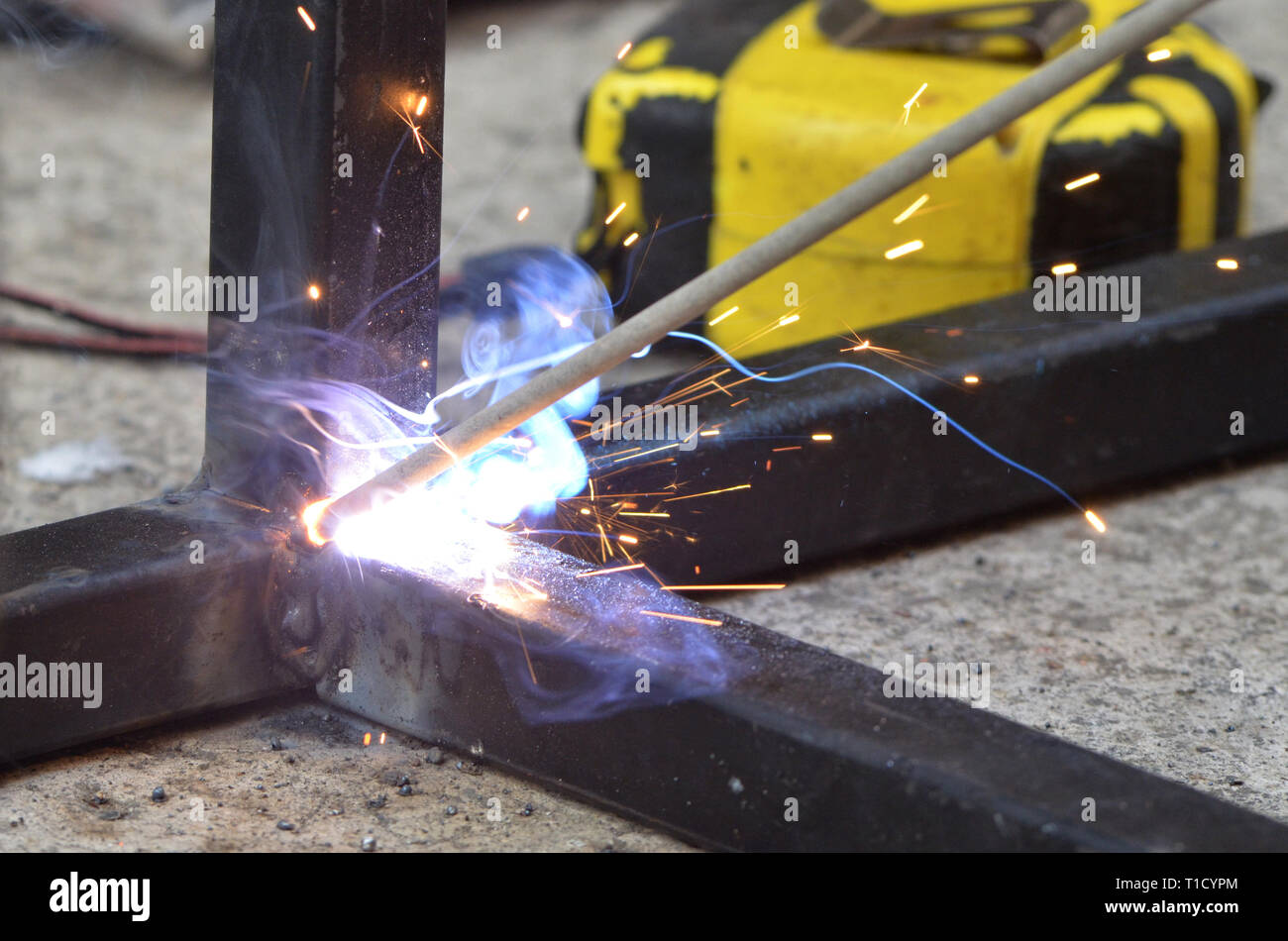 Spark from weld work when welder welding iron, steel structure in ...