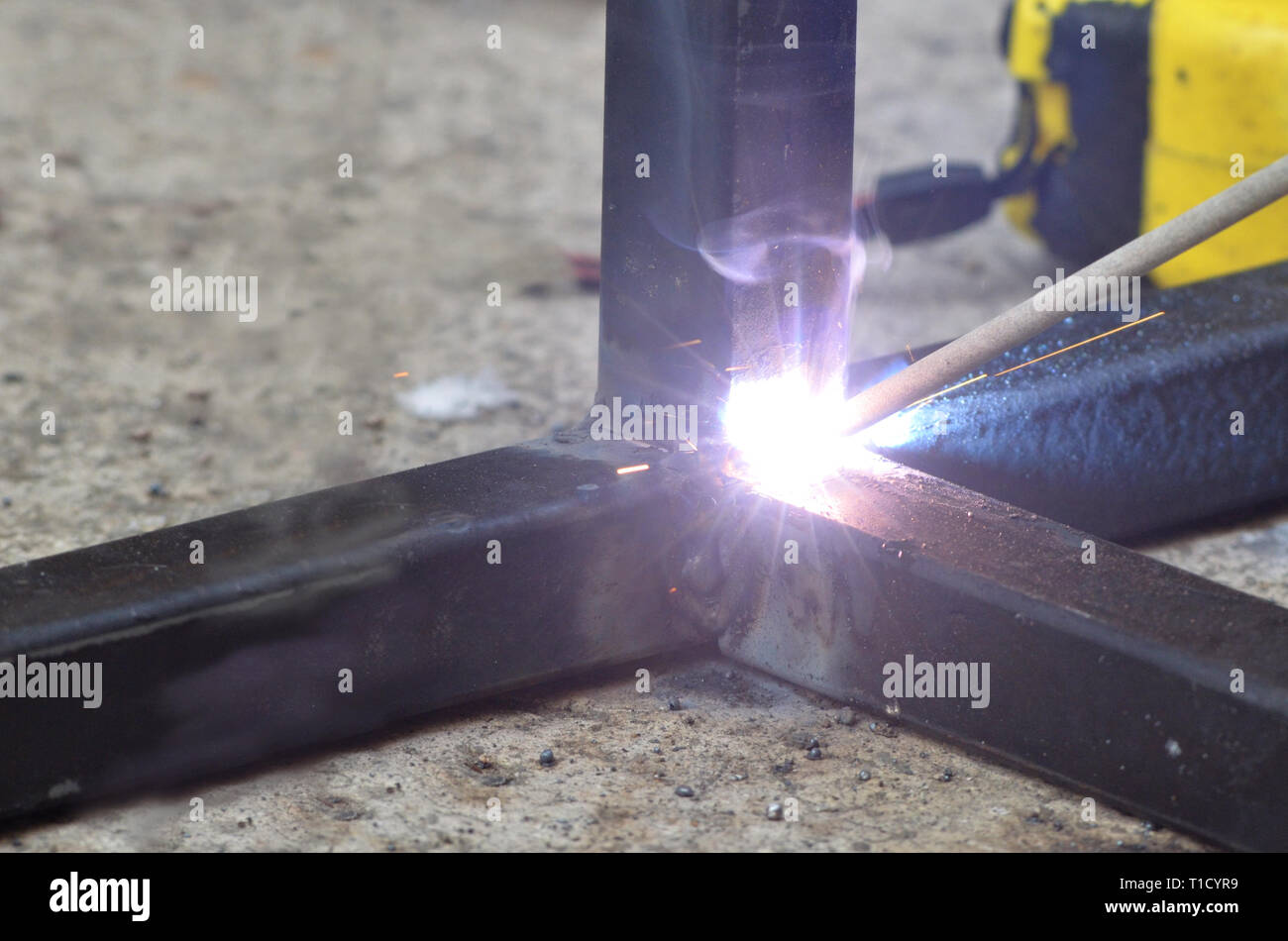 Spark from weld work when welder welding iron, steel structure in ...