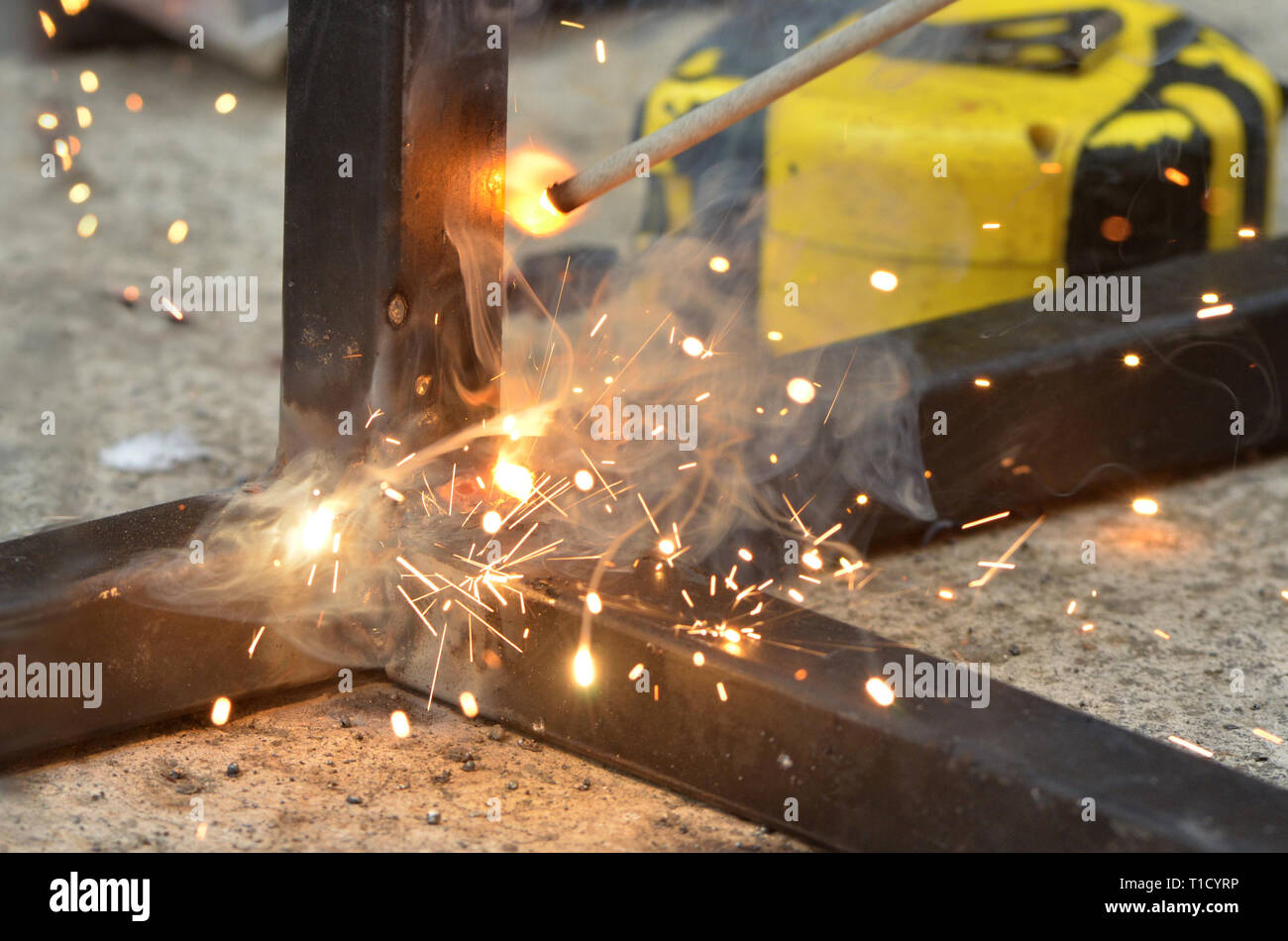 Spark from weld work when welder welding iron, steel structure in ...