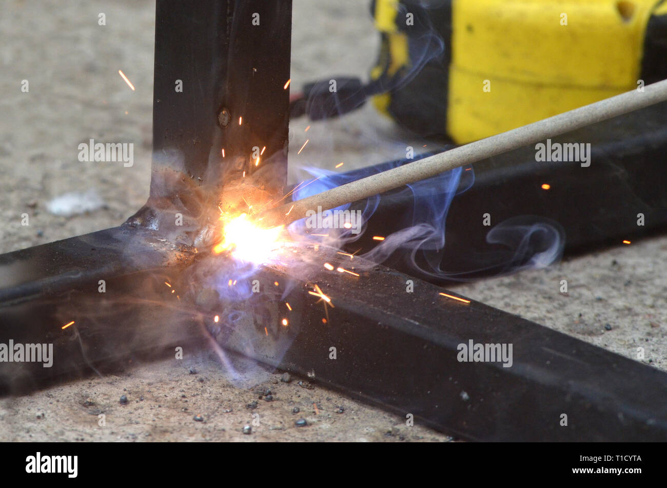 Spark from weld work when welder welding iron, steel structure in ...
