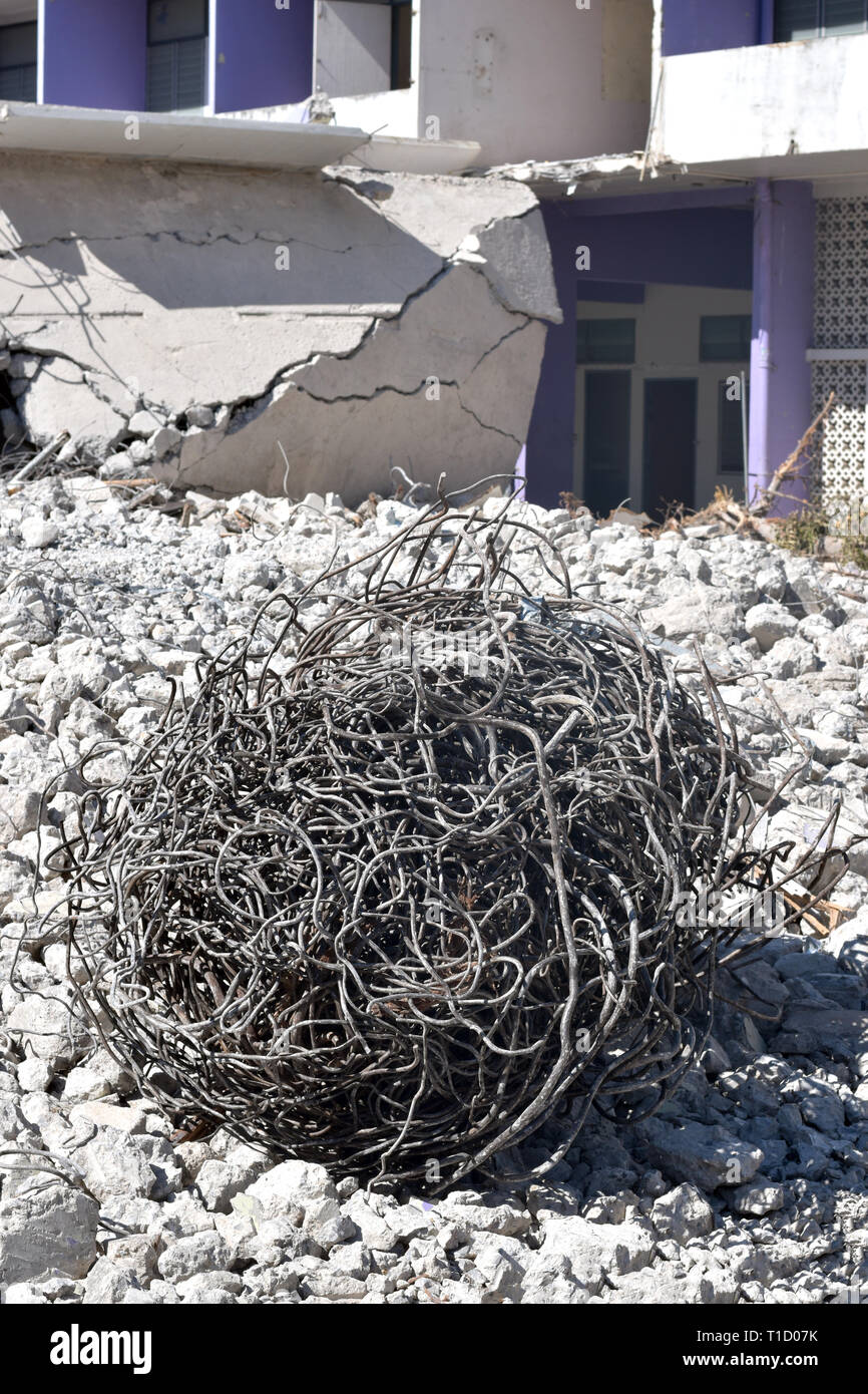 Steel bar that compressed as ball after demolished a building, iron ...