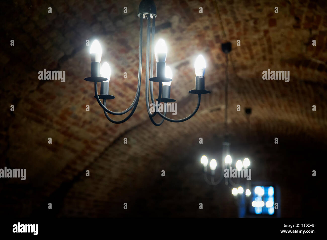 Lights in an old castle corridor, horizontal image Stock Photo - Alamy