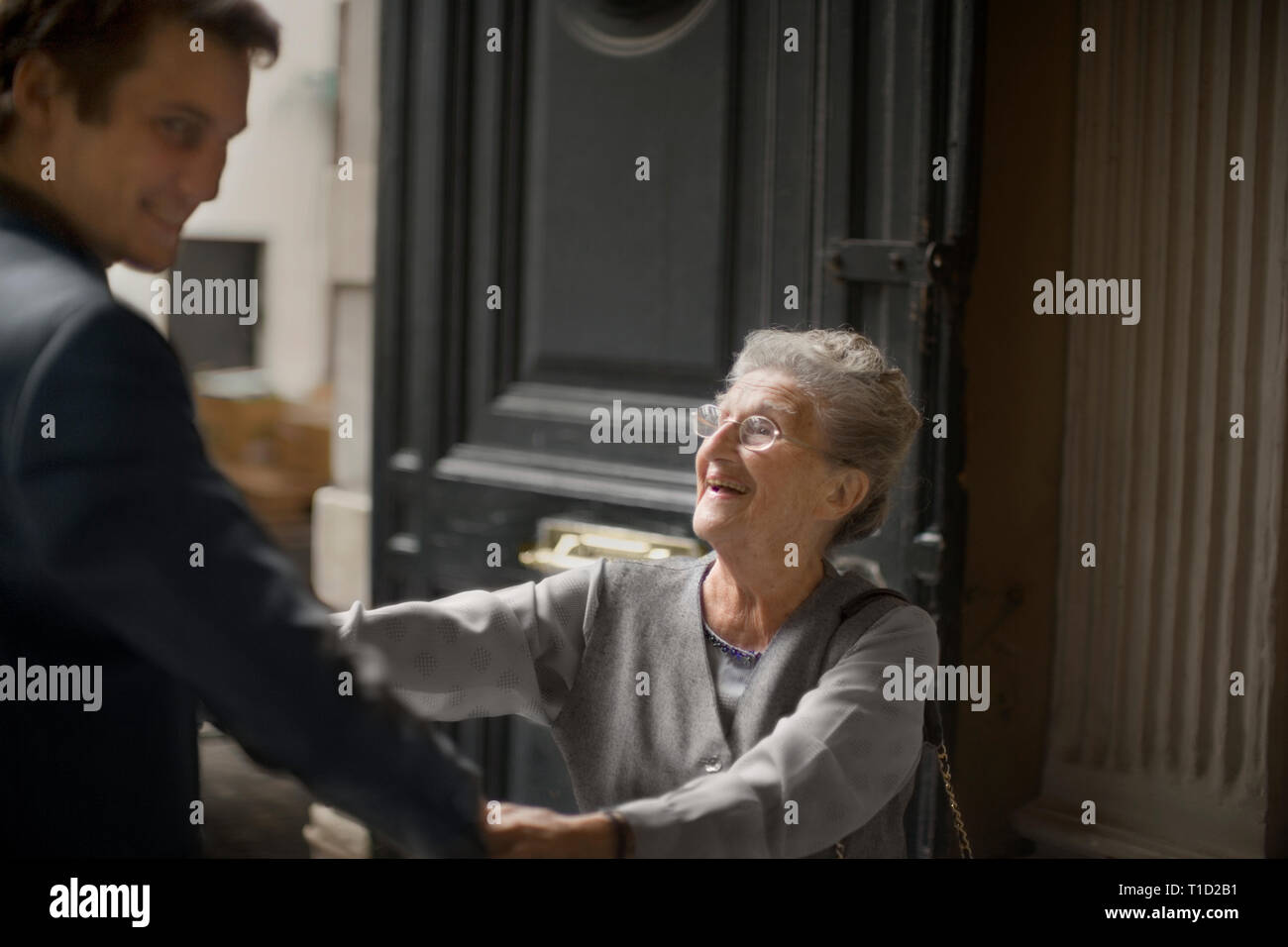 View of an elderly woman with her son Stock Photo - Alamy