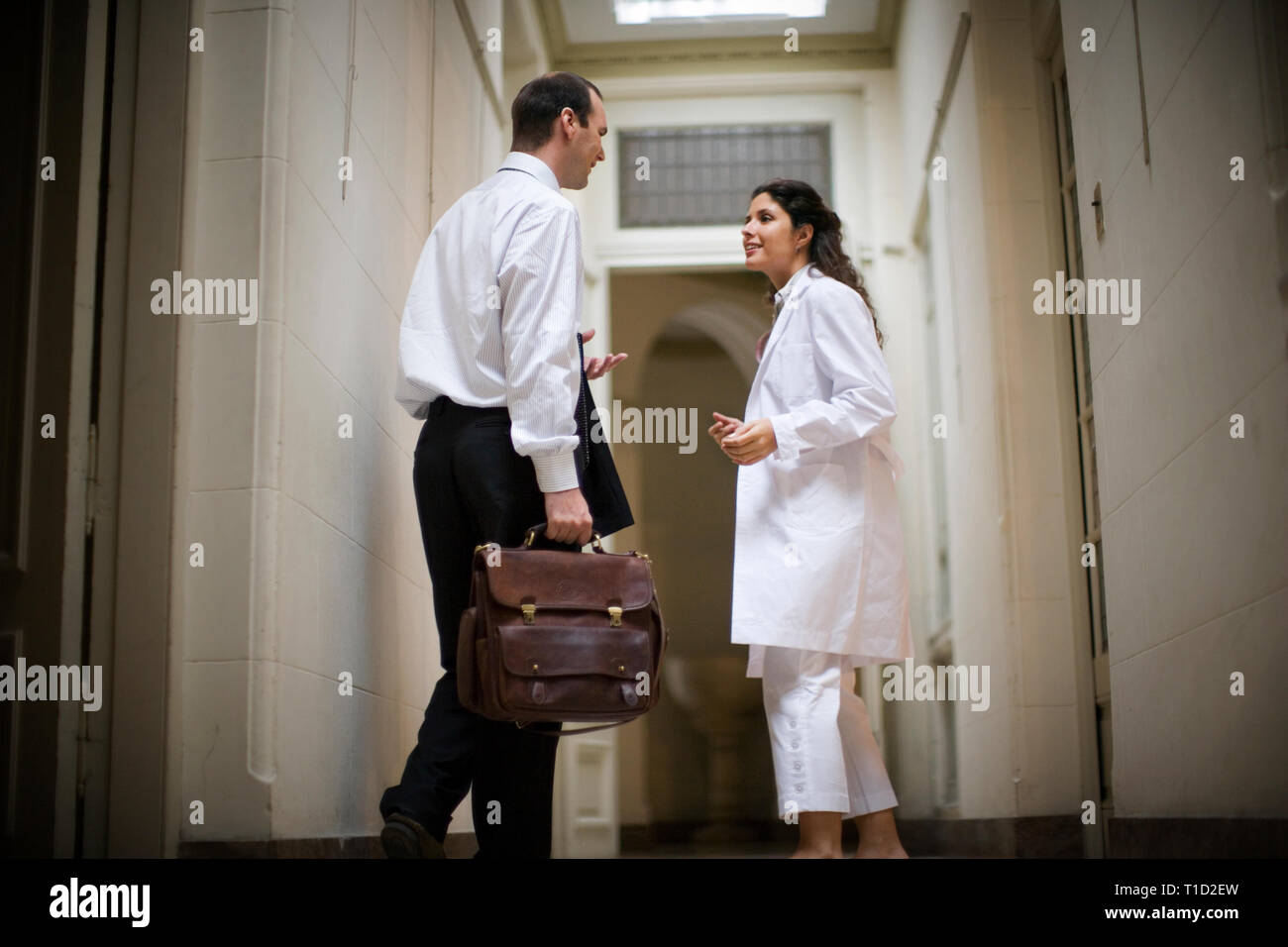 View of two people in a conversation Stock Photo - Alamy