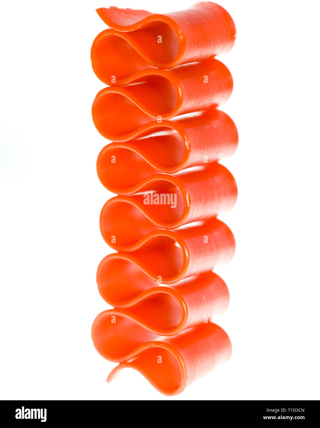 Red Ribbon Candy against White Background Stock Photo - Alamy