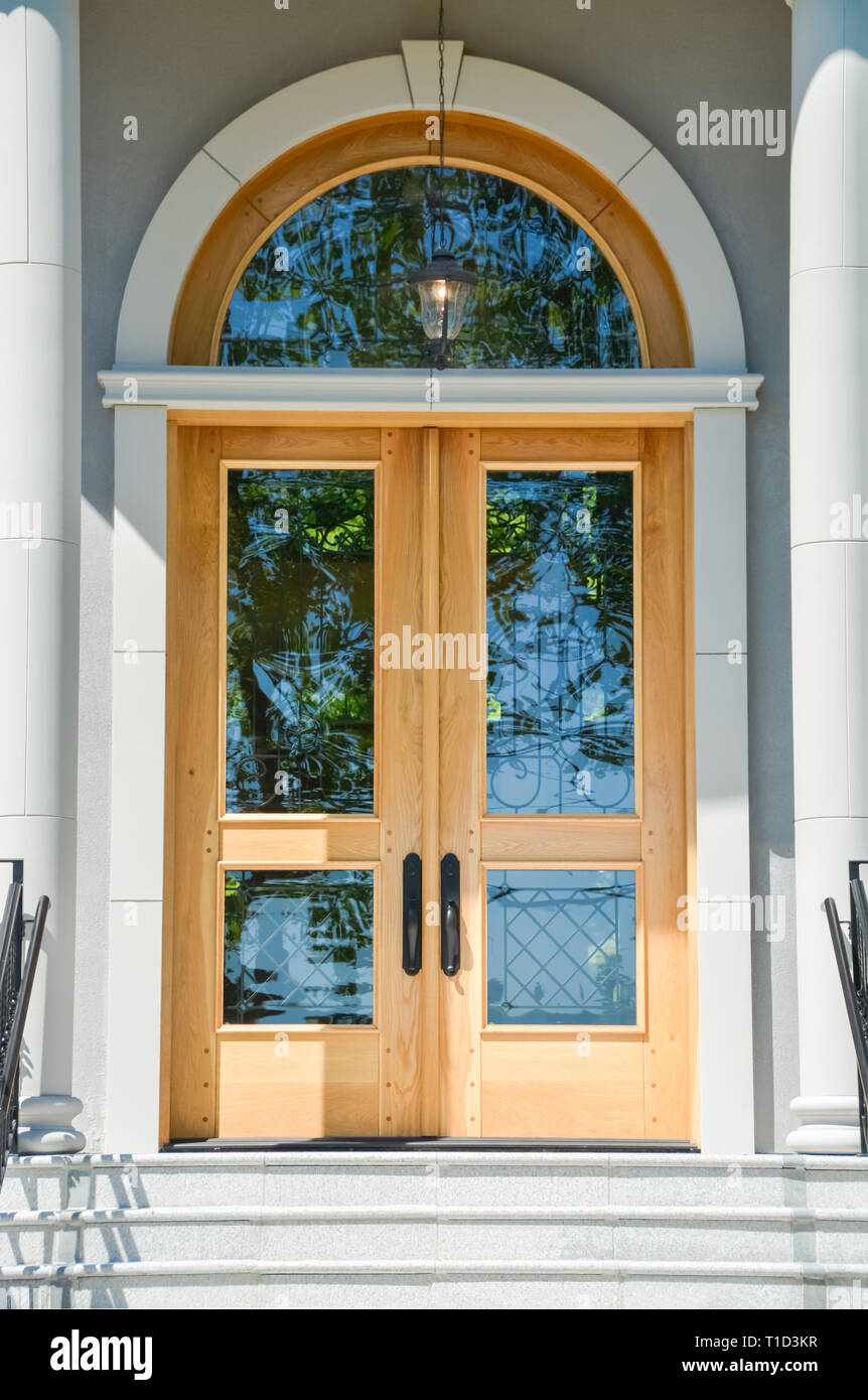 Entrance of luxury family residential house with doorsteps in front ...