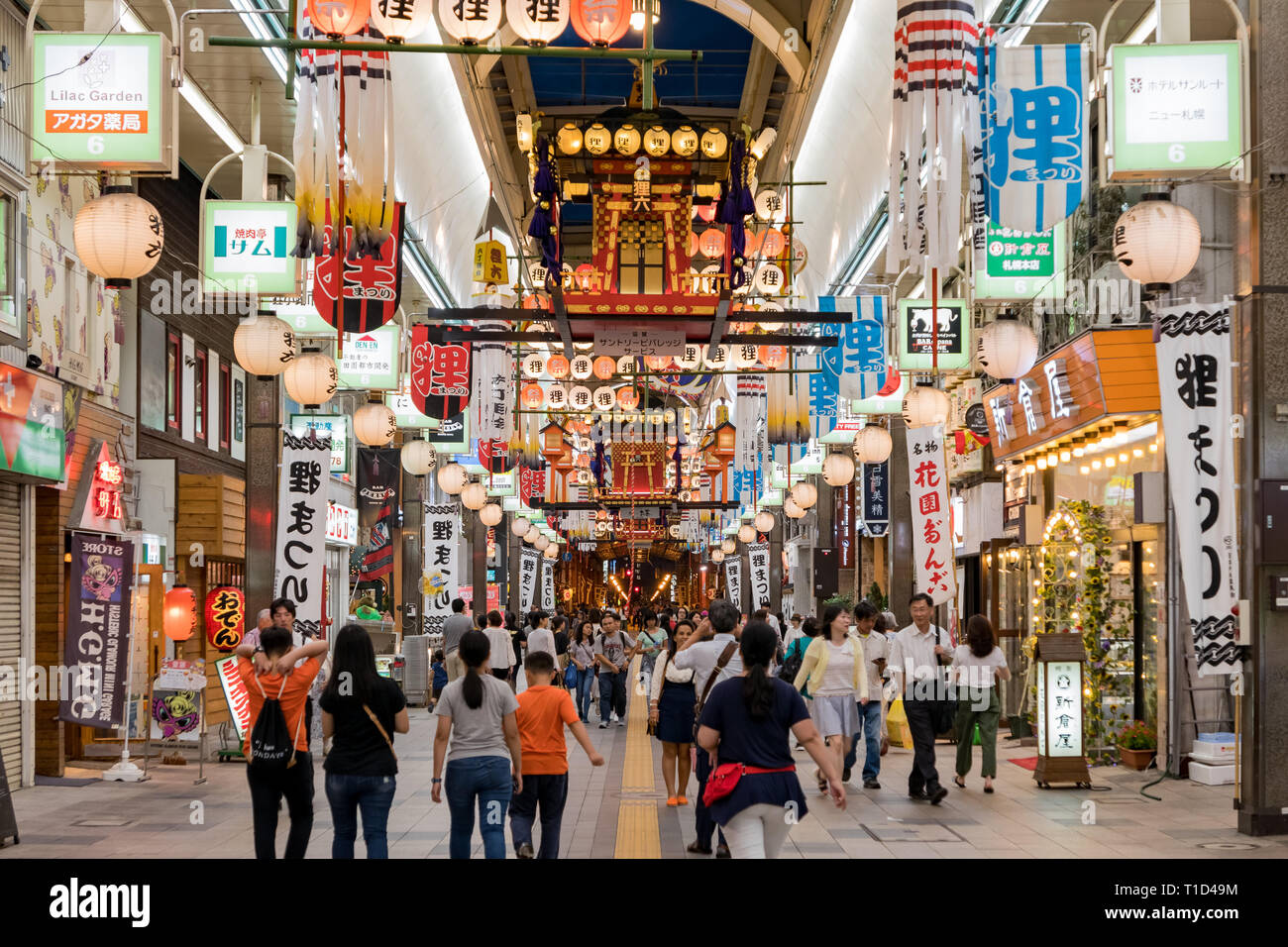 Sapporo, AUG 7: Night view of the famous Tanukikoji Shopping Street on ...
