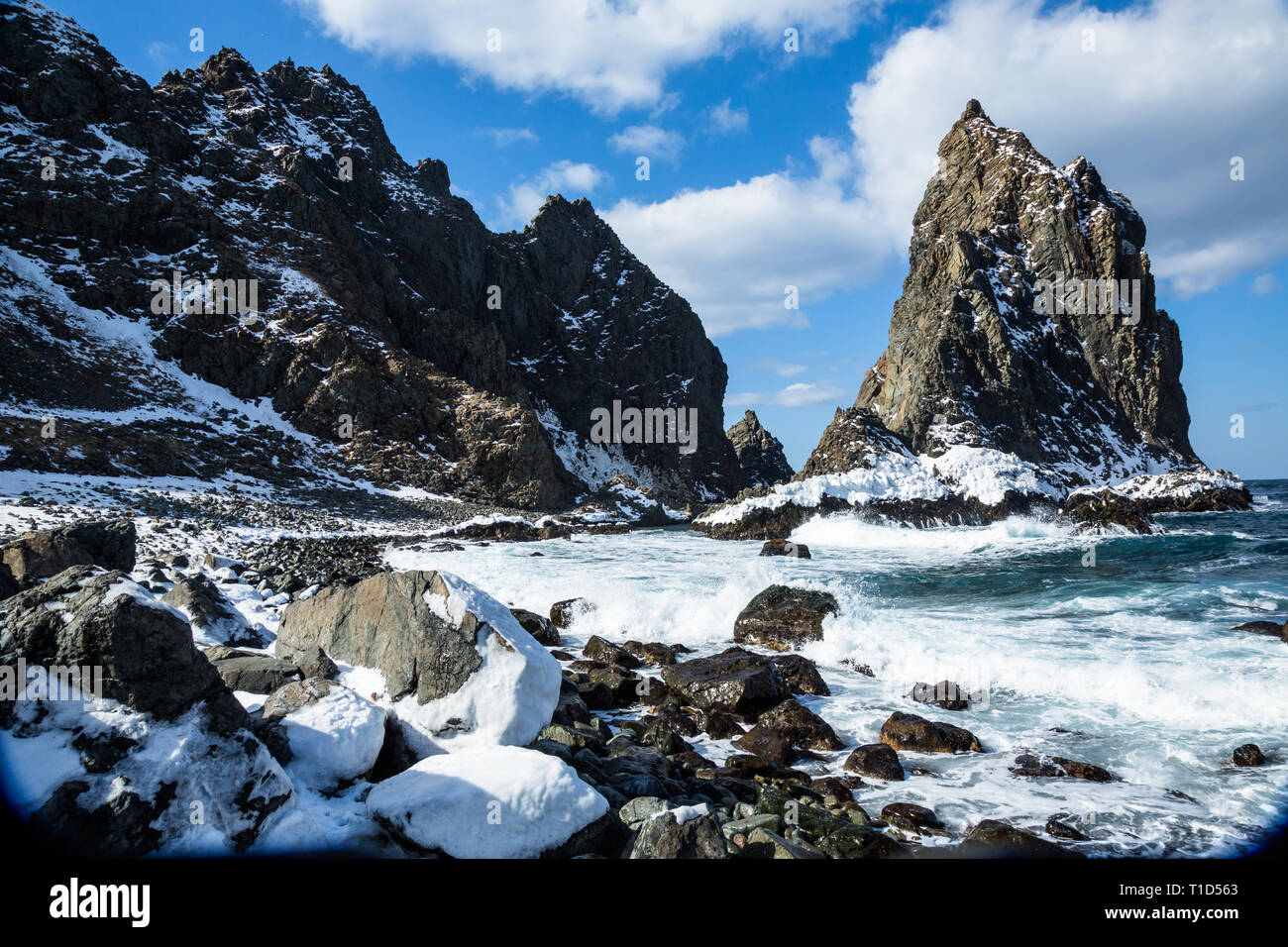 Massive sea stack on the coast of the Shakotan Penninsula in the island ...