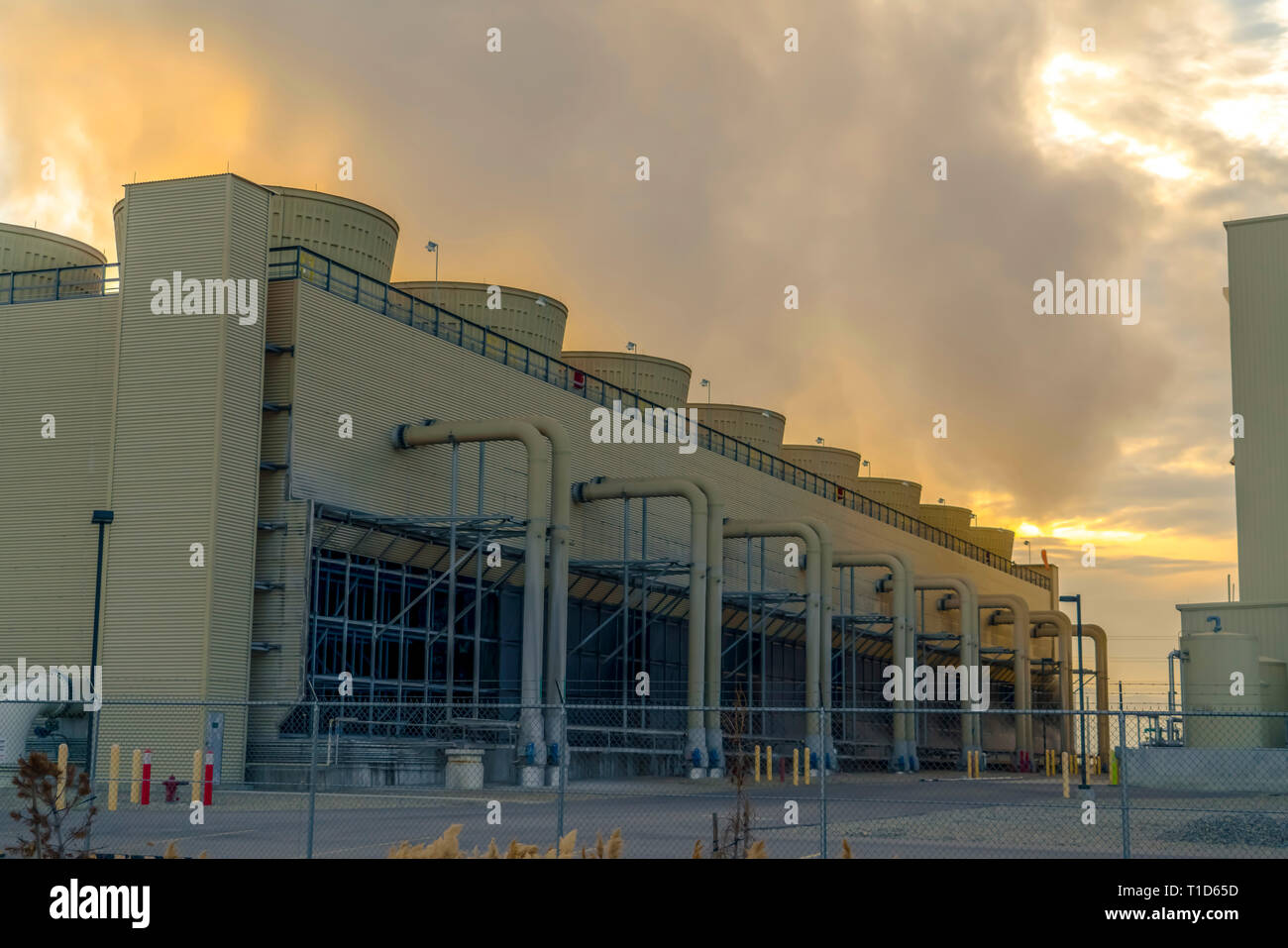 Power Plant emitting steam in Utah at sunset. Power Plant in Utah ...