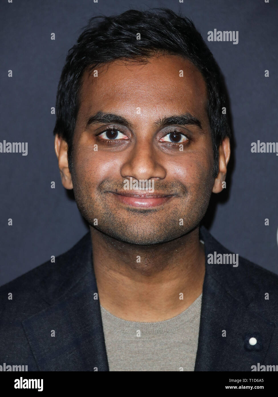HOLLYWOOD, LOS ANGELES, CA, USA - MARCH 21: Actor Aziz Ansari arrives ...