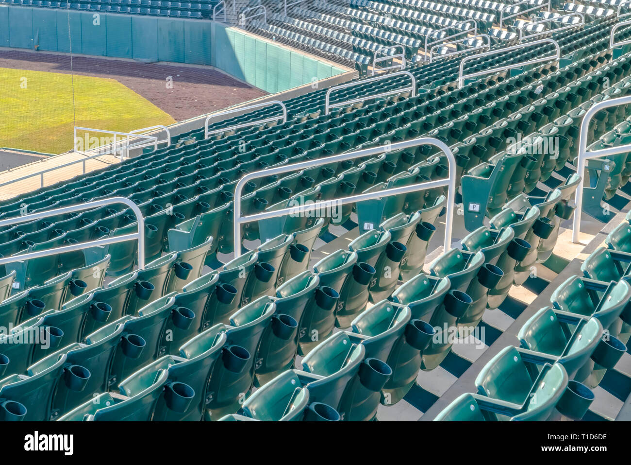 Tiered seating at a sports arena on a sunny day. Details of a sports ...