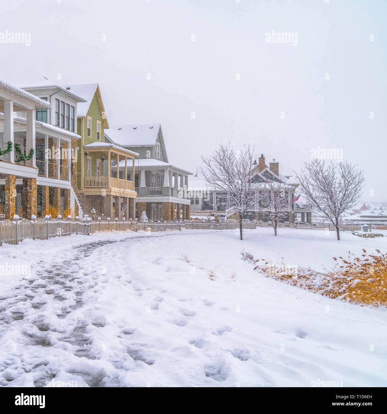Winter landscape with homes and footprints in Utah. Scenic winter ...