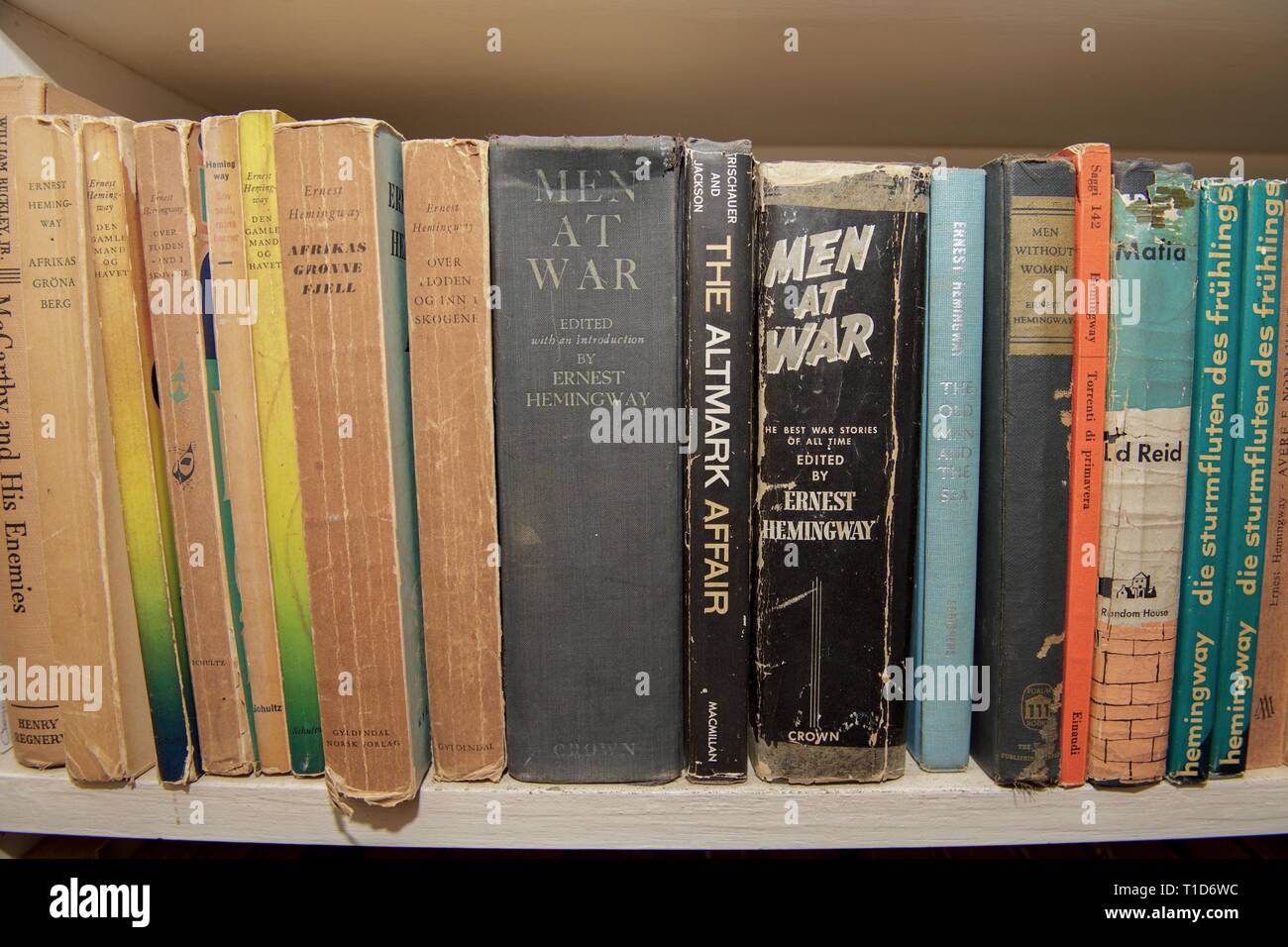 Some of author Ernest Hemingway's own books are seen on a shelf of his ...