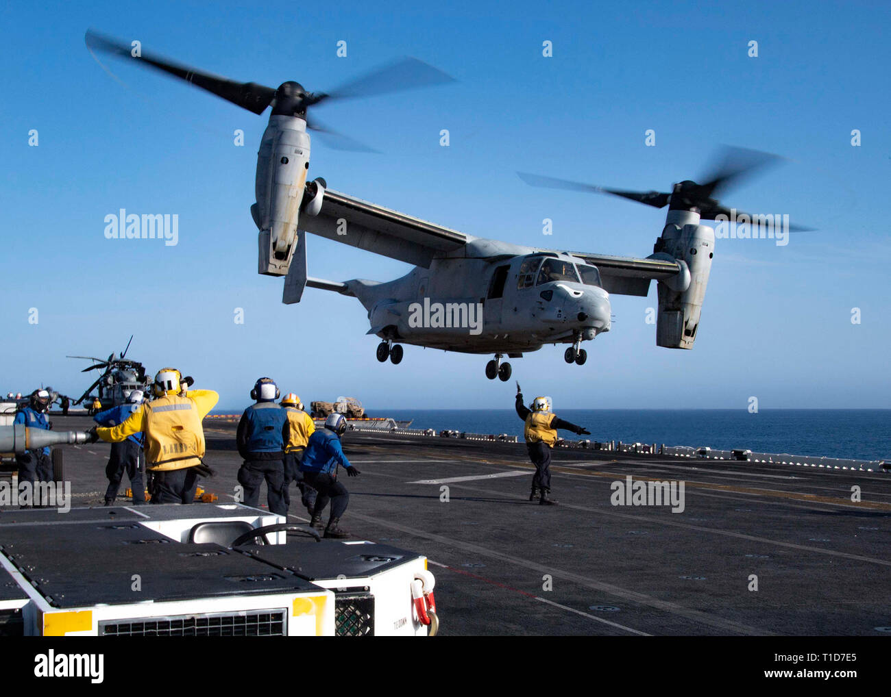 A U.S. Marine MV-22B Osprey attached to Marine Medium Tiltrotor ...