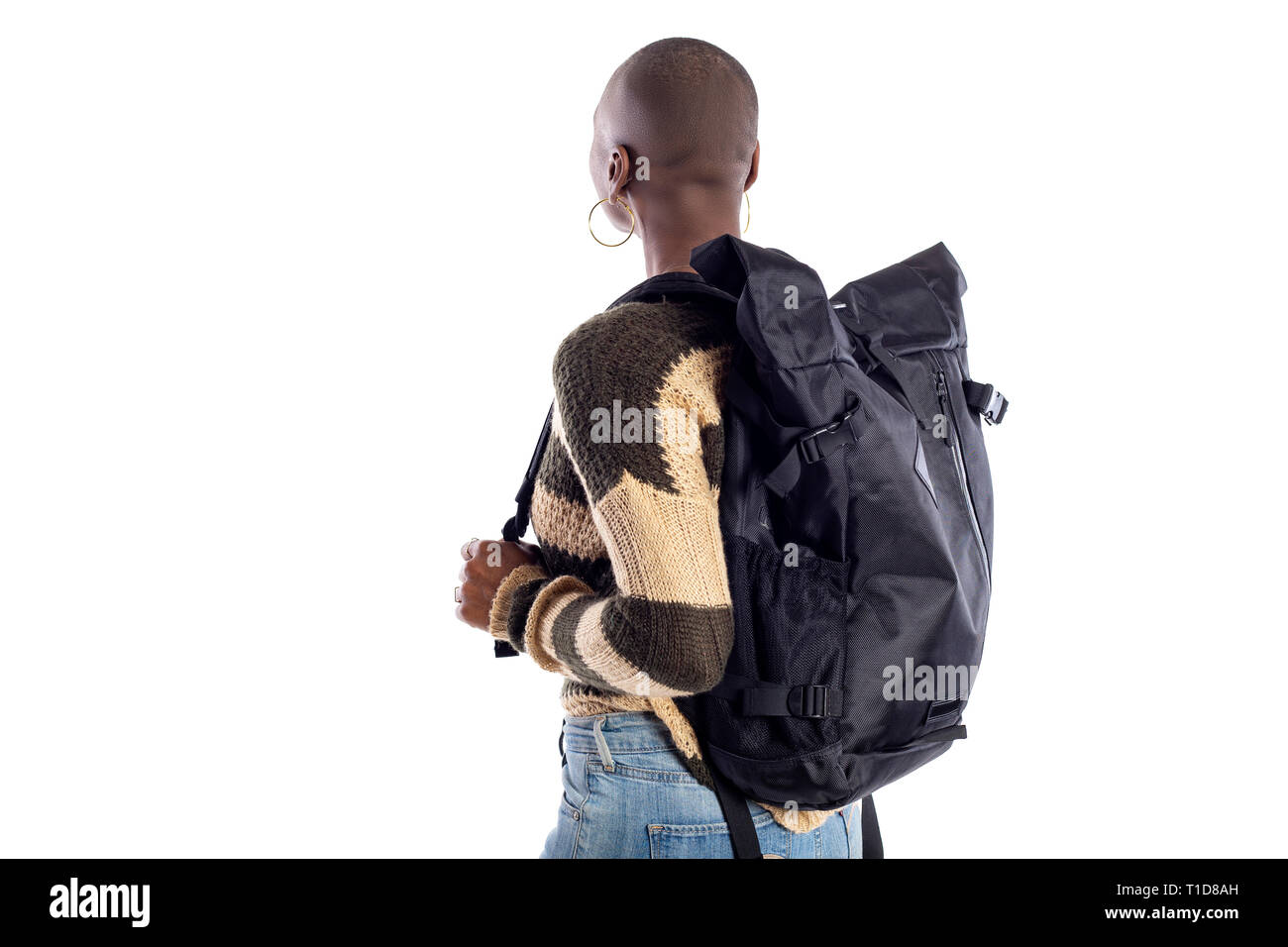 Black African American female wearing a backpack looking at white ...