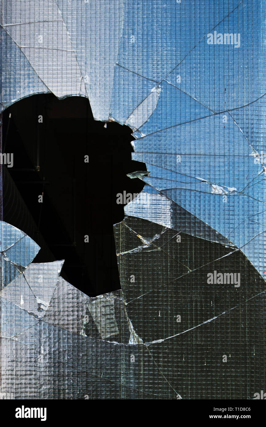 Broken glass hole hi-res stock photography and images - Alamy