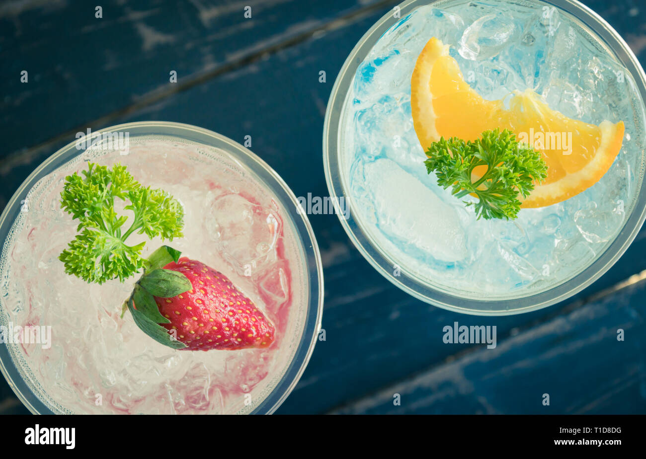 Blue Red Italian Soda Cold Beverage and Lemon Strawberry Fruit and ...