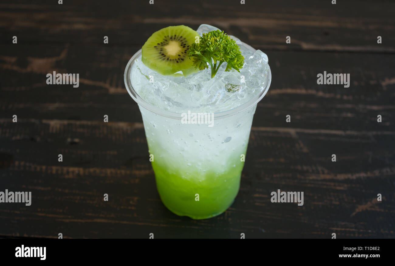 Green Italian Soda Cold Beverage and Kiwi Fruit and Parsley Center ...