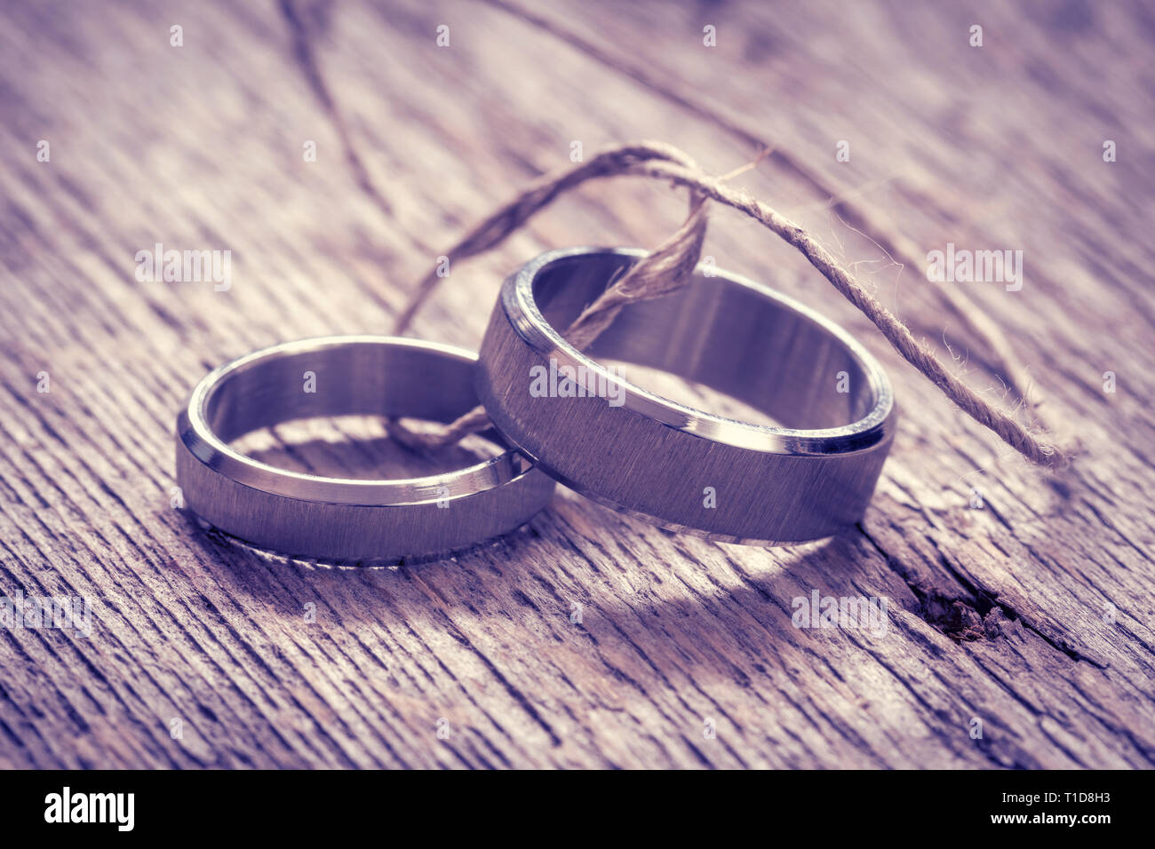 Golden wedding rings tied hi-res stock photography and images - Alamy