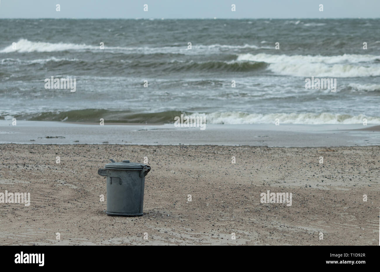 recycling box rubbish bin at sand beach Stock Photo - Alamy