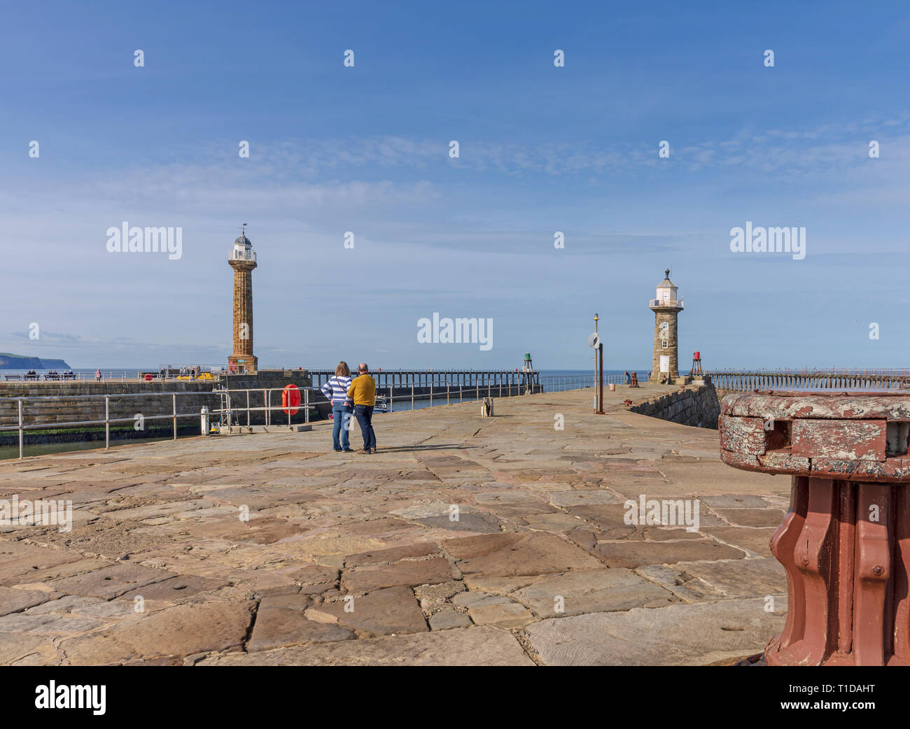 Whitby lighthouse and two piers hi-res stock photography and images - Alamy