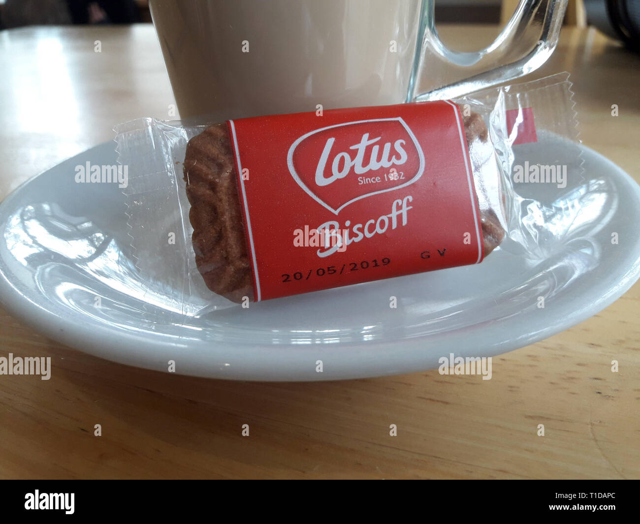 Coffee Latte and Lotus Biscoff on a table in a café in the Cotswolds ...