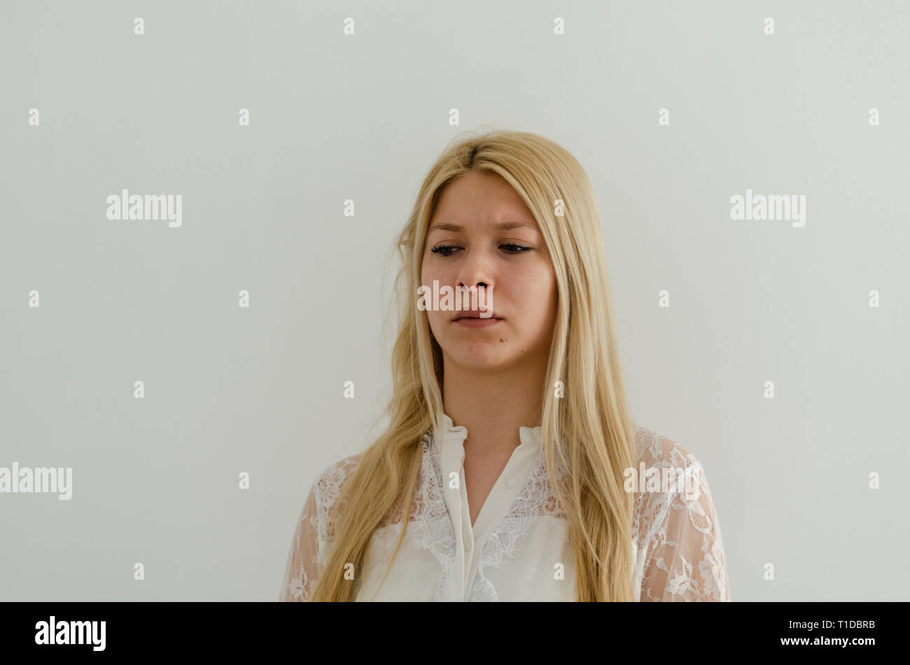Scowling facial expression hi-res stock photography and images - Alamy