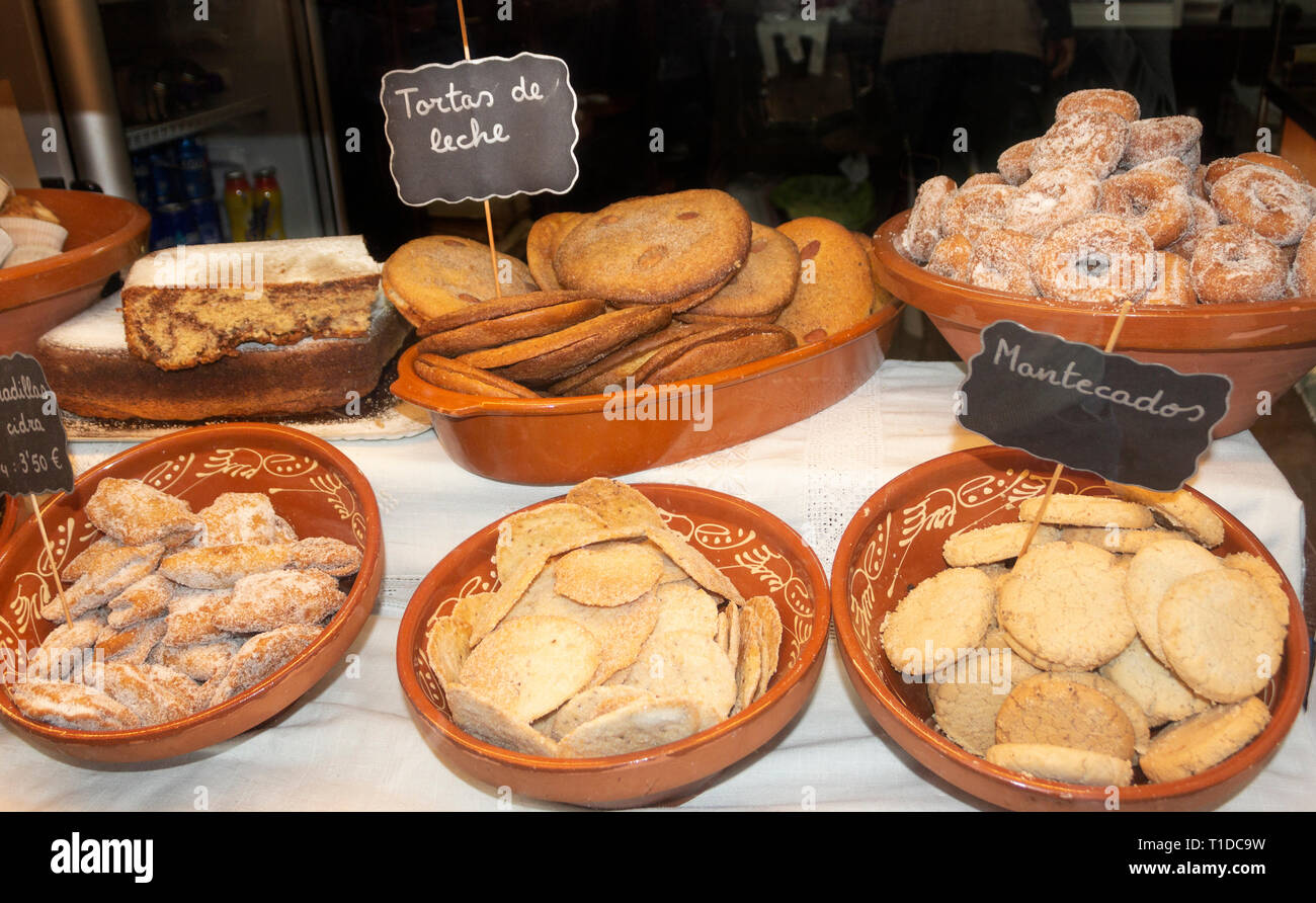 Typical Spanish biscuits and pastries on display in shop window ...