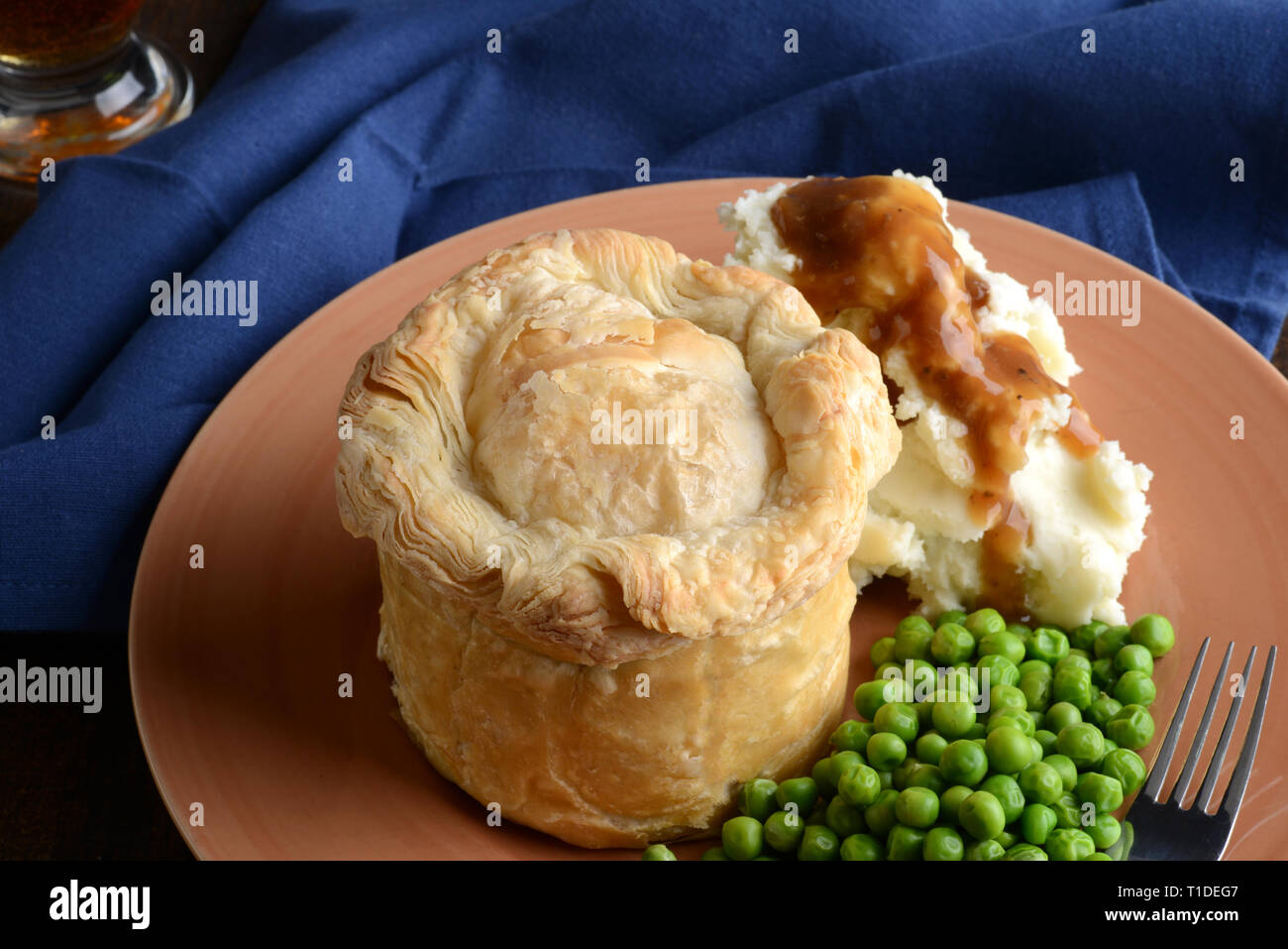 closeup top view pub meat pie with mashed potatoes and peas Stock Photo ...