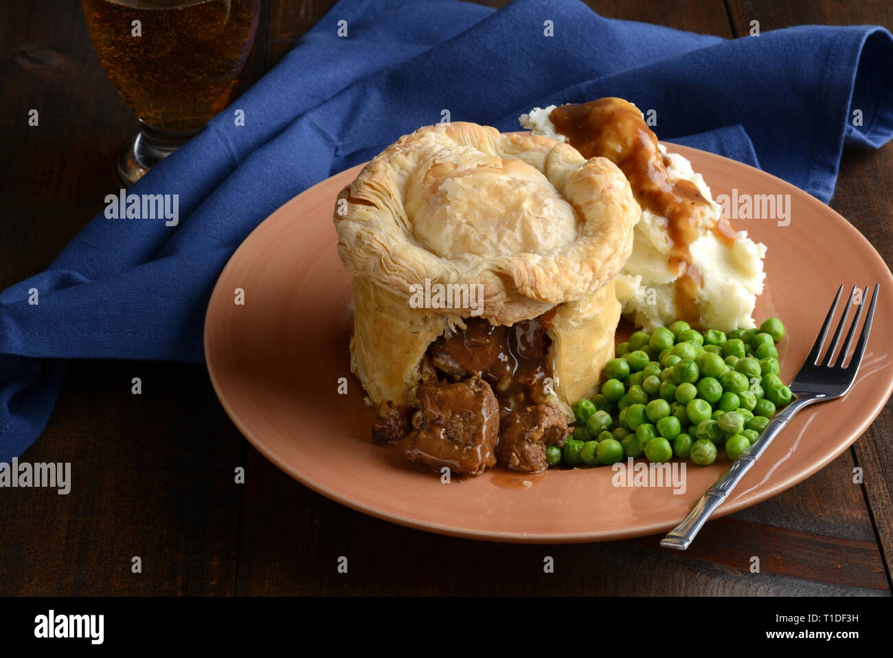 steak pub pie with gravy Stock Photo - Alamy