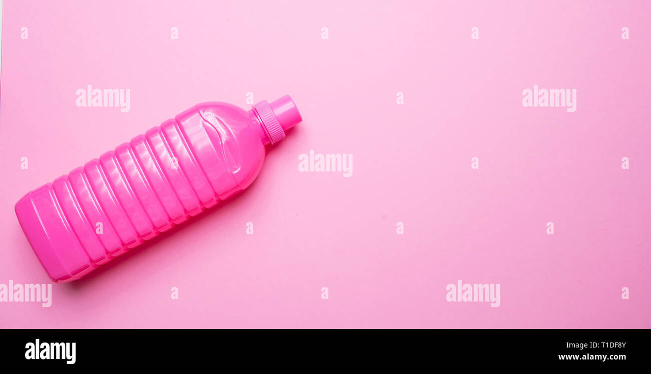 Fabric softener blank no name bright pink color on pink background, top ...