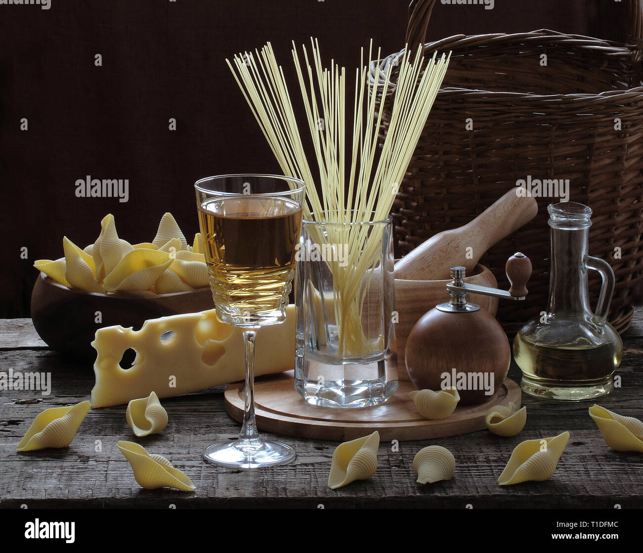 Still life with pasta, spaghetti and cheese Stock Photo - Alamy