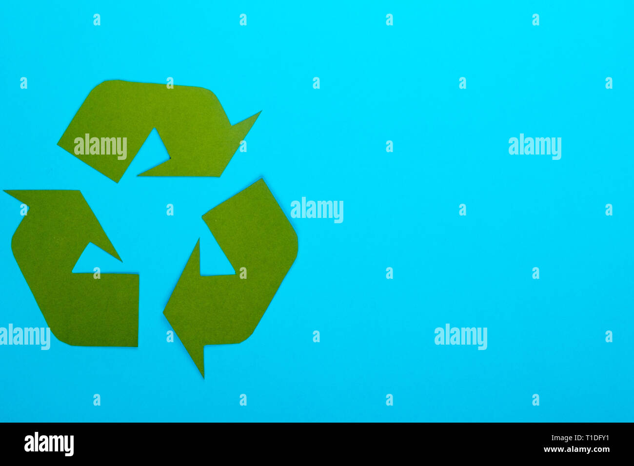 Recycle concept showing the green recycle logo with on a blue ...