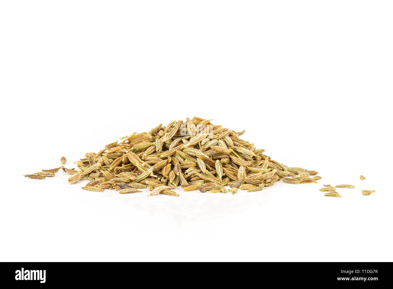 Lot of whole roman caraway seeds stack isolated on white background ...