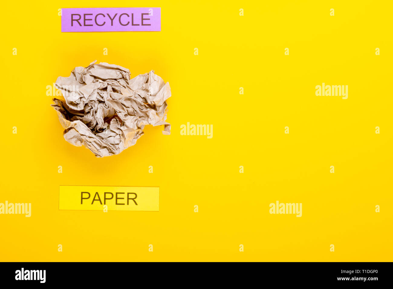 Recycling concept showing recycle & paper on a yellow background Stock ...