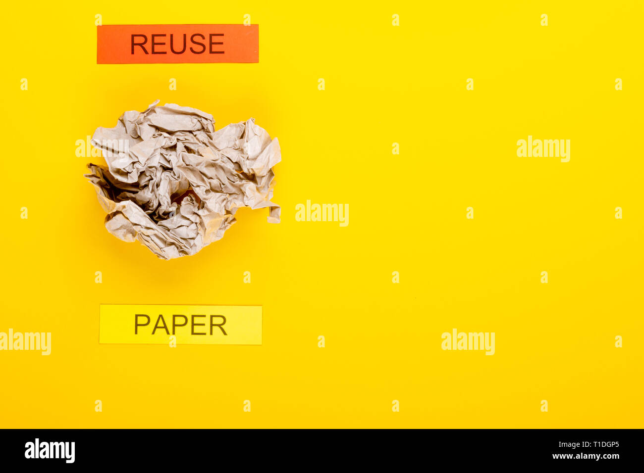 Recycling concept showing reuse & paper on a yellow background Stock ...