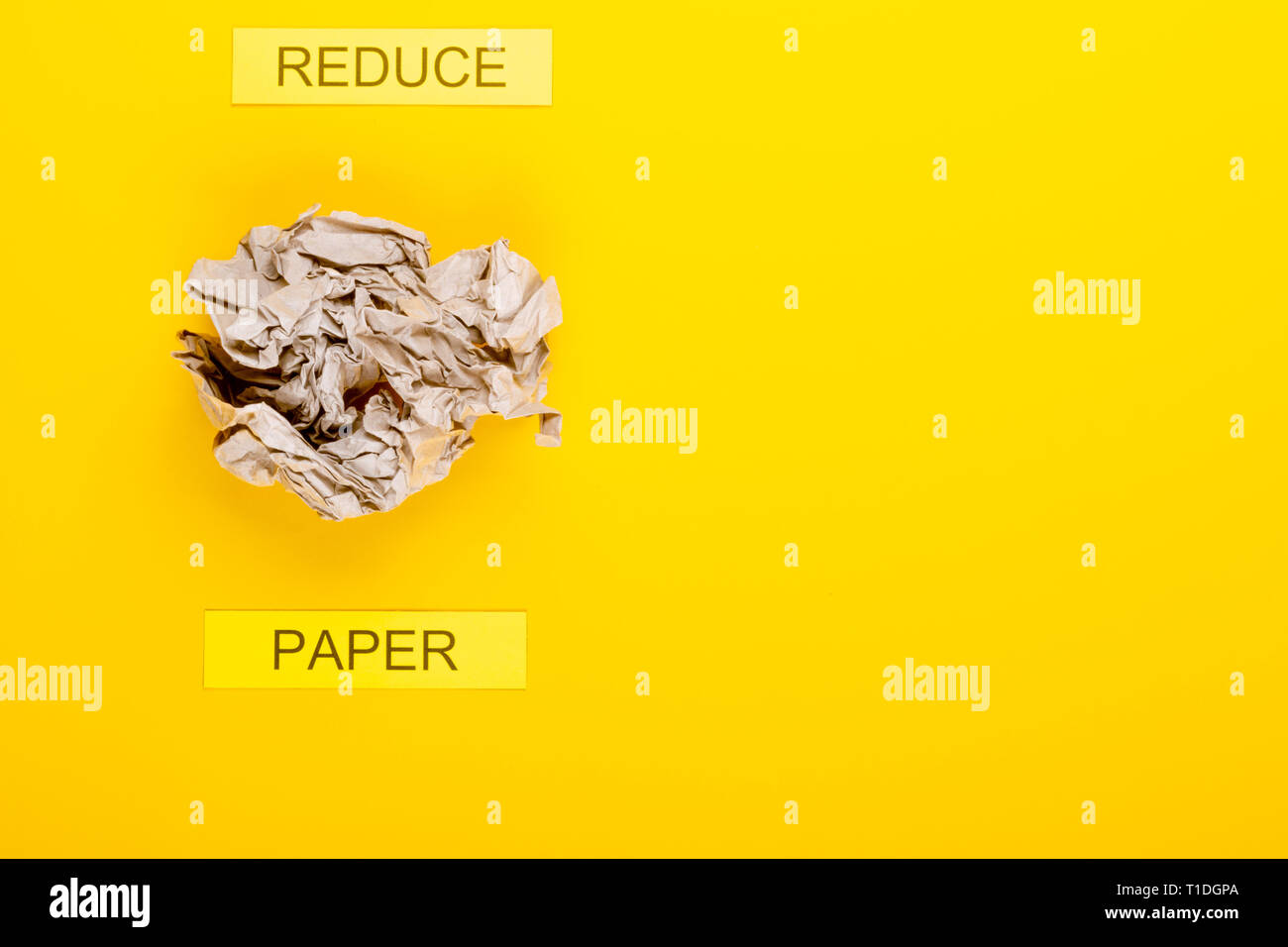Recycling concept showing reduce & paper on a yellow background Stock ...