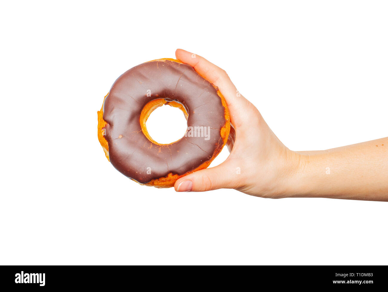Female hand holding donut. Colorful donut on pastel white background ...