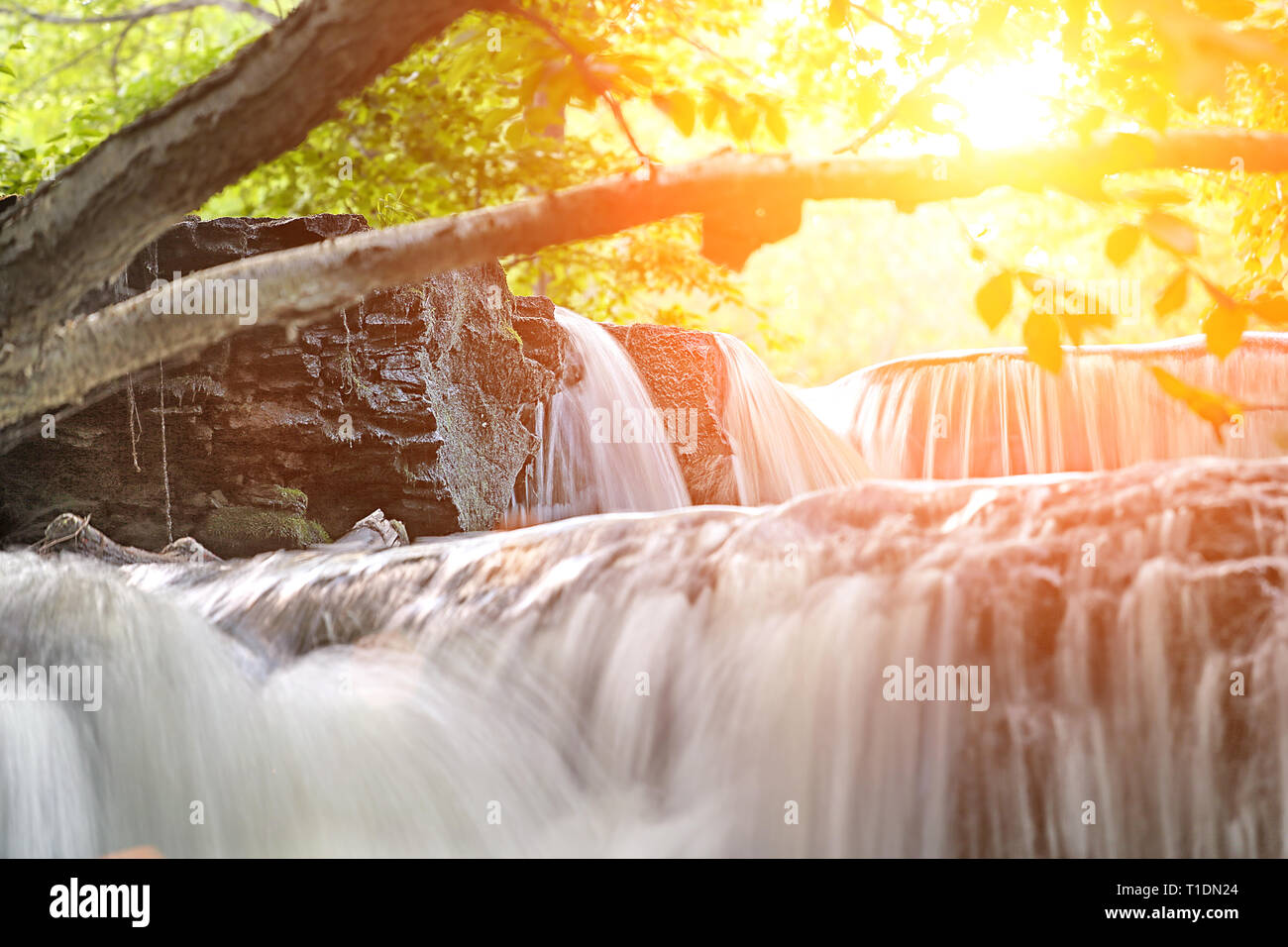 Sun Sets over the waterfalls Stock Photo - Alamy