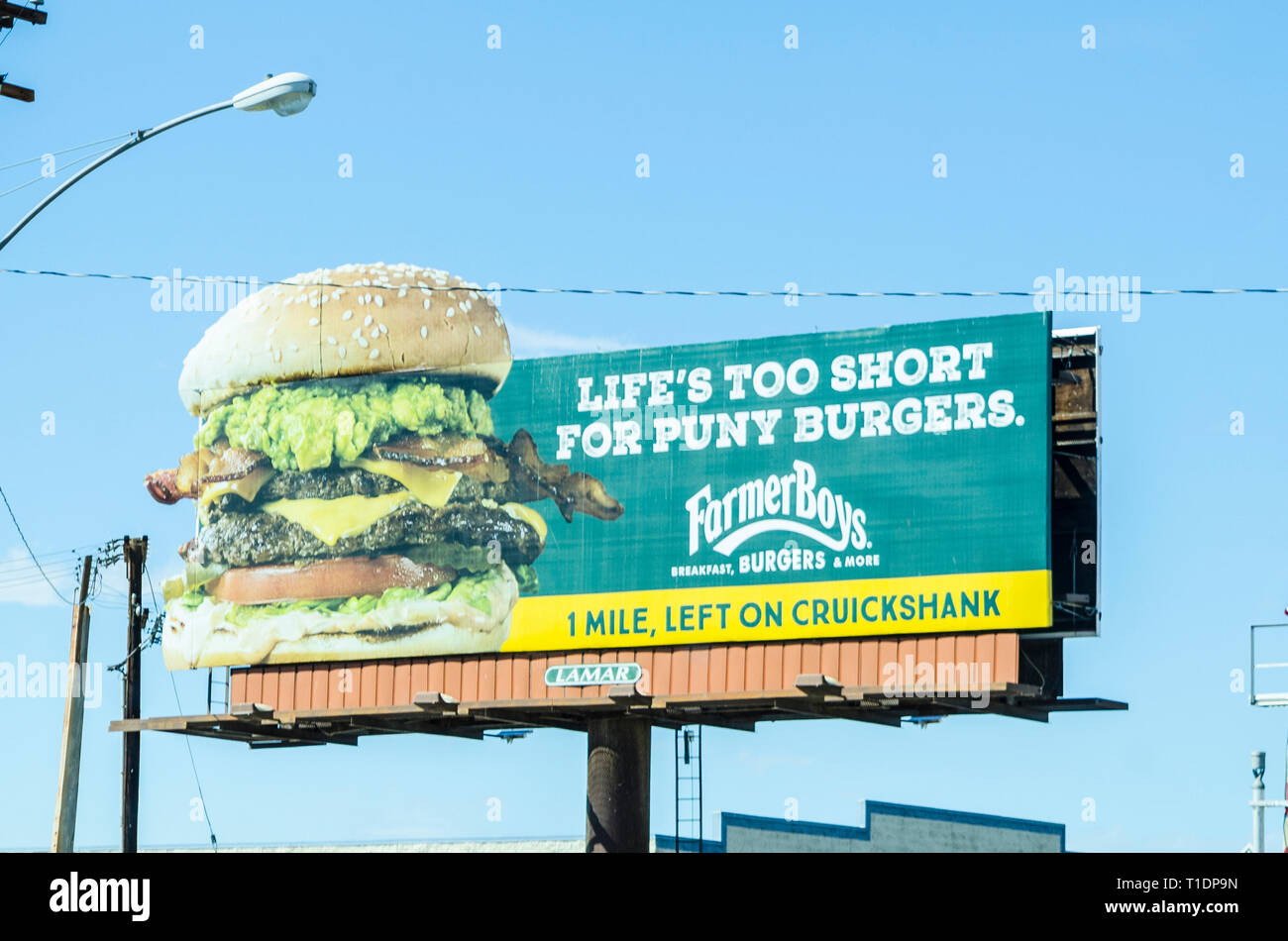 A billboard advertising a Farmers Bros. restaurant in the Imperial ...