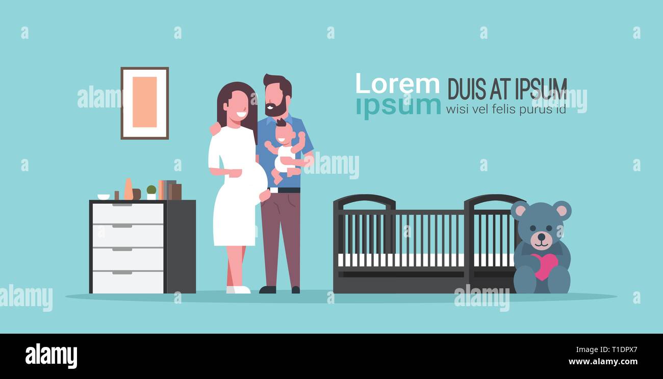 husband with pregnancy wife holding newborn baby son standing near crib ...