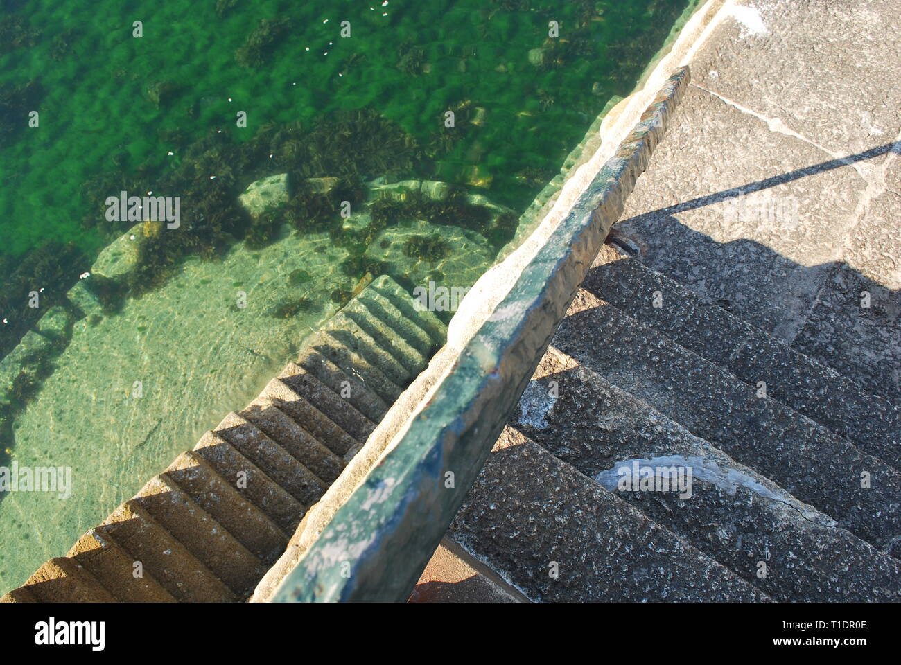 Granite steps leading from the promenade to a landing jetty Stock Photo ...