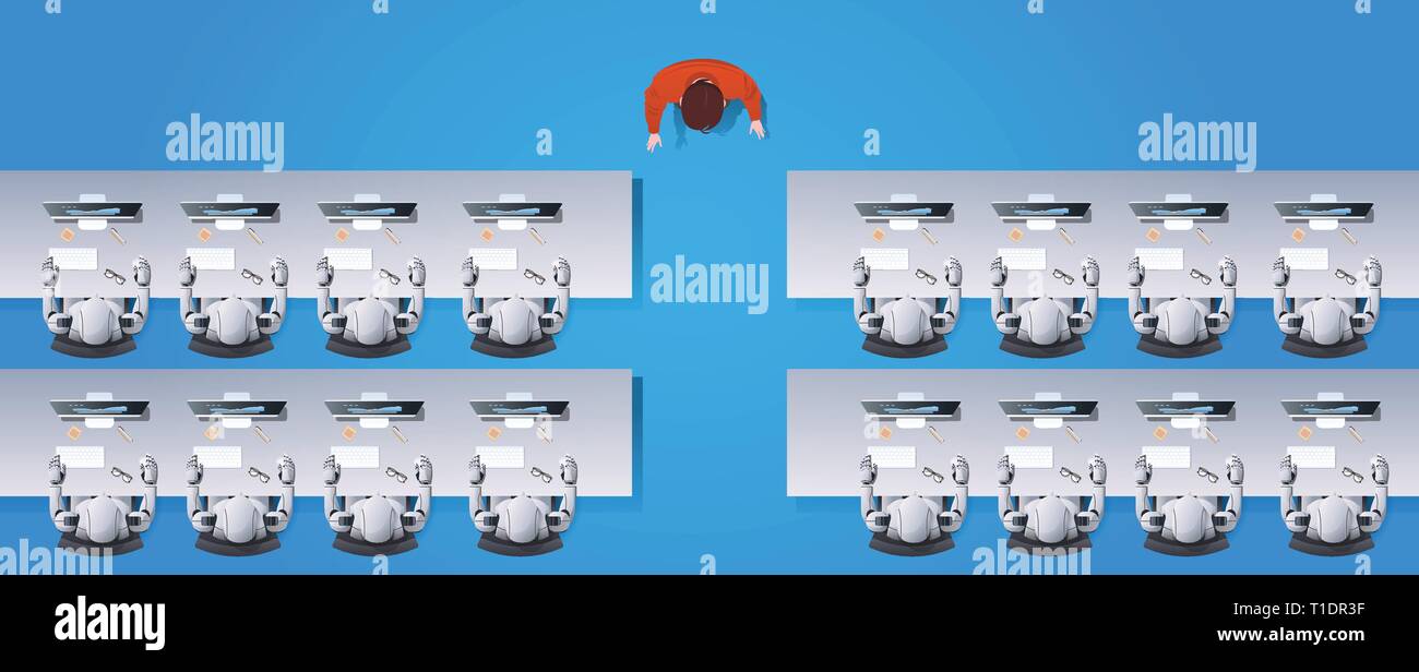 man teacher teaching humanoid robots group sitting at desks in ...