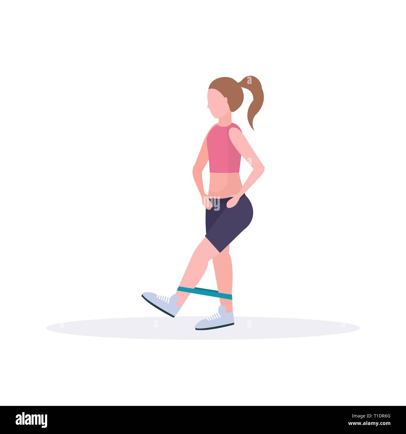 sporty woman doing exercises with resistance band girl training in gym ...