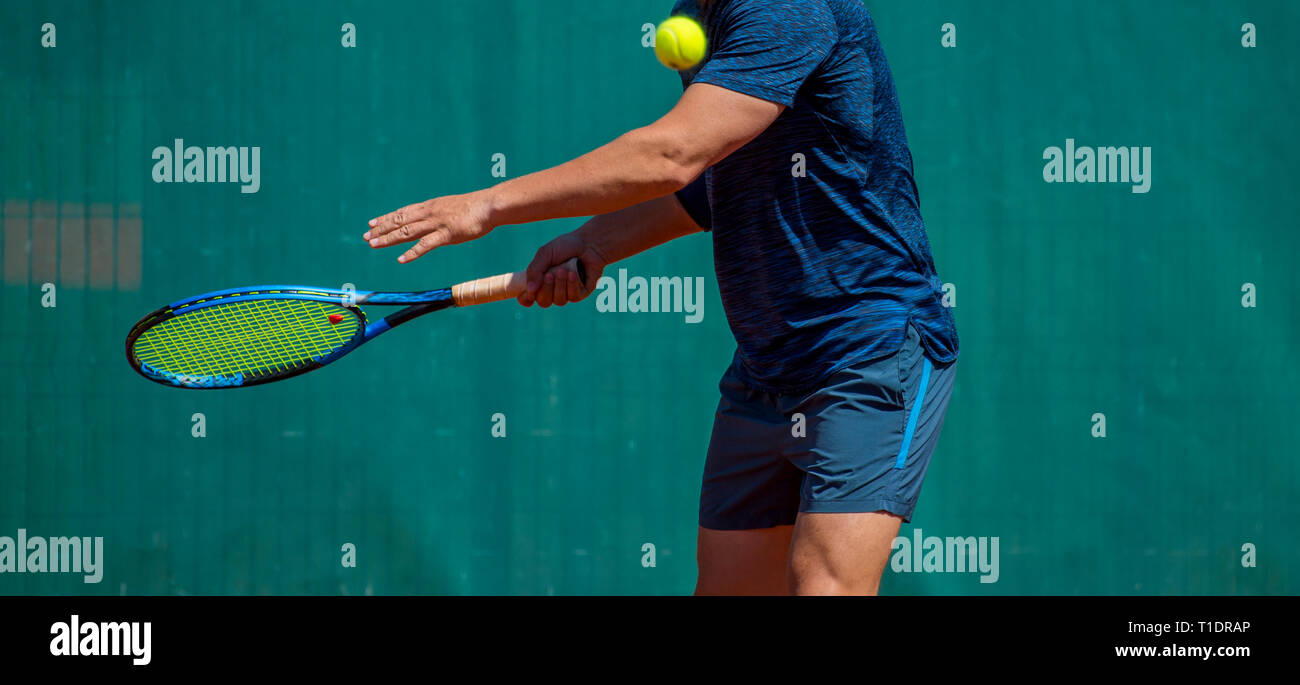 Tennis Player Swinging Racket High Resolution Stock Photography and ...